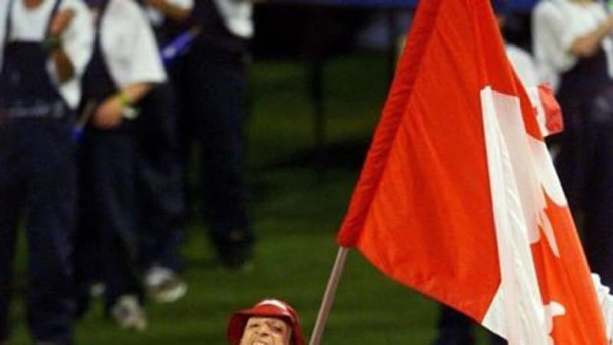 Gary Longhi, Canada’s flag-bearer at 2000 Paralympics, dies at age 56 ...