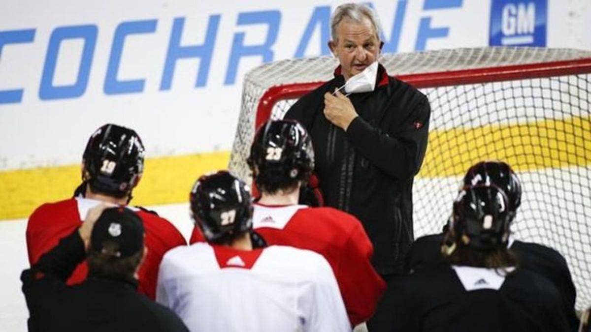 New head coach Darryl Sutter conducts his first on-ice practice with ...