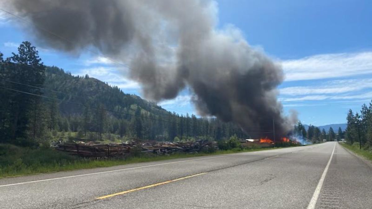 Wildfire service attacks fire from ground and air, Highway 97 closed ...