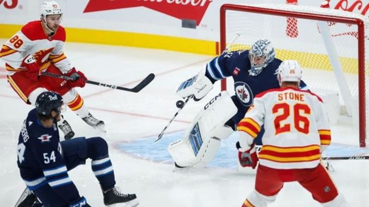 Jets dominate Flames behind Rittich’s 37 saves, four second-period ...