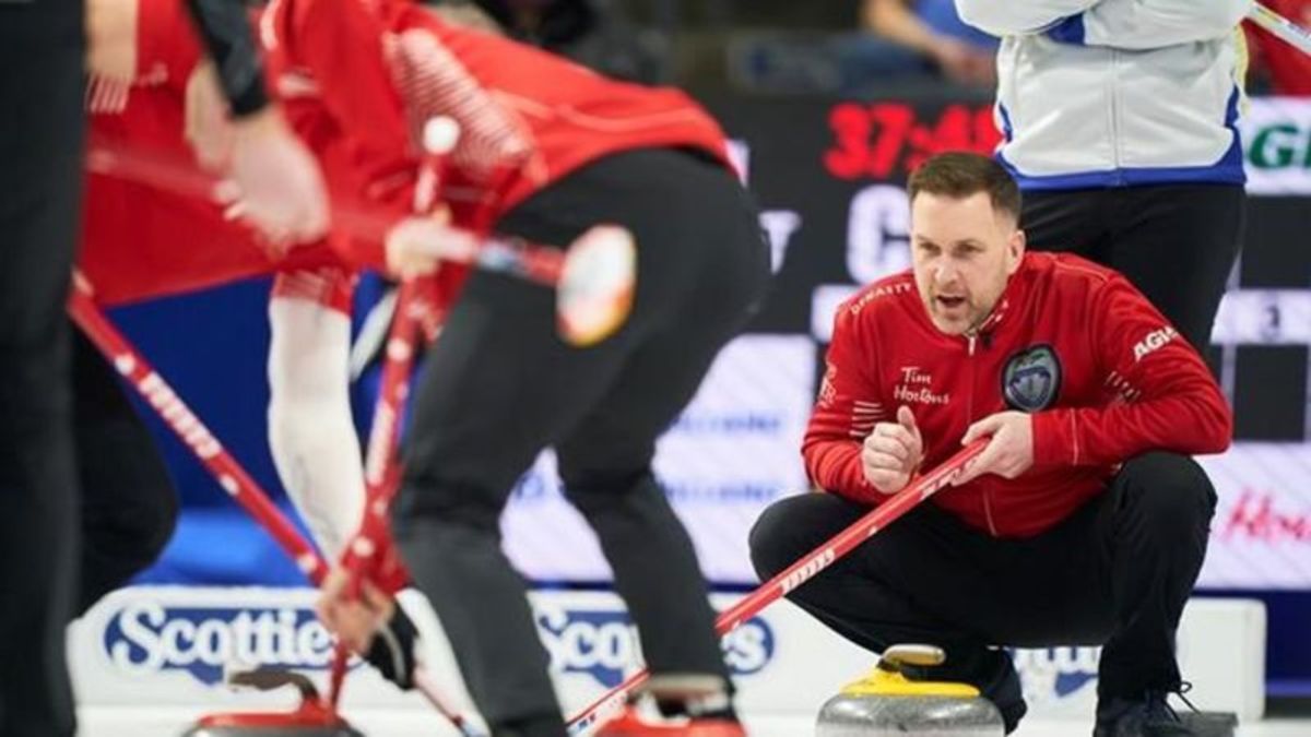 Defending champion Gushue wins opening game at the Tim Hortons Brier ...