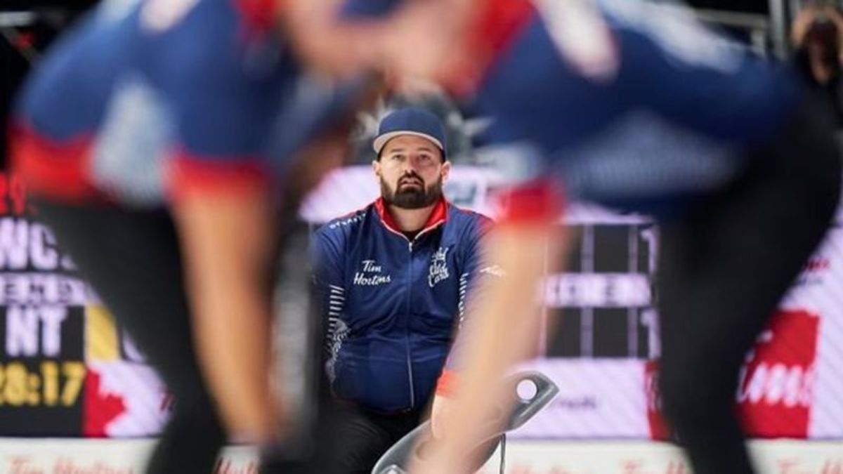 Wild Card 2 skip Reid Carruthers outscores NWT’s Jamie Koe 11-7 at Tim ...