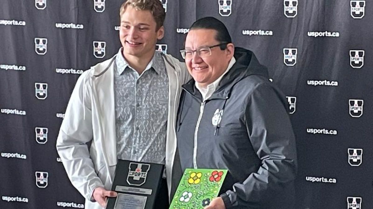 Neufeld presented with Male Student-Athlete Community Service Award ...