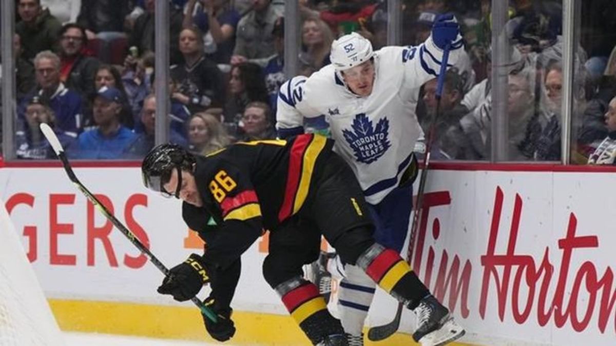 Canucks sign defenceman Christian Wolanin to two-year, two-way ...