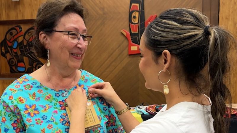 Local woman awarded 5-millionth moose hide pin for her work | CKPG Today