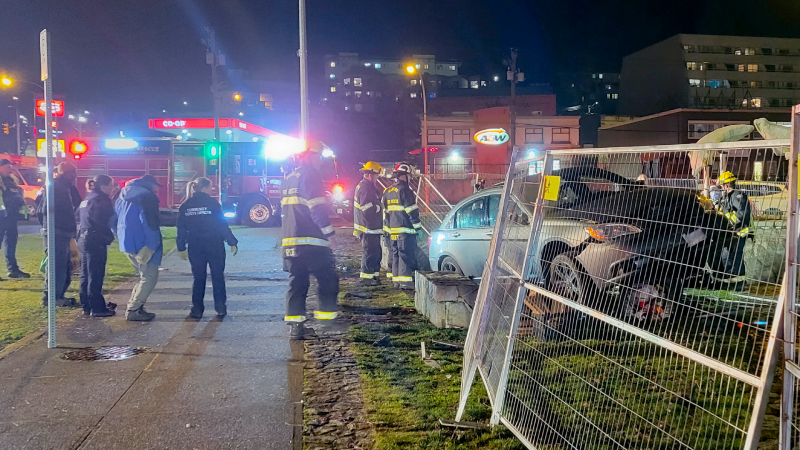 Vehicle crashes through light post & fencing near Port Place Shopping ...
